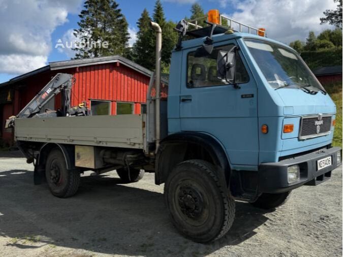 Prodaje se MAN 9.150FAE med Hiab 052 radiostyrt kran - EU OK 08.2027 kamion s ravnom platformom na aukciji