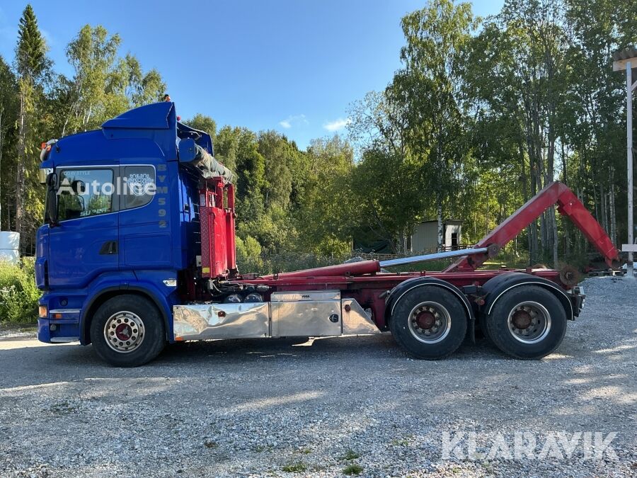 Prodaje se Scania R560LB6X4HNB rol kiper sa kukom na aukciji