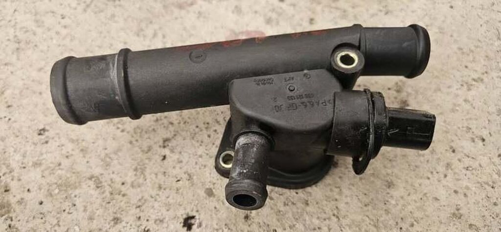 KUCISTE TERMOSTATA 1.9 ZA FIAT STILO ZA 2003. GOD. -