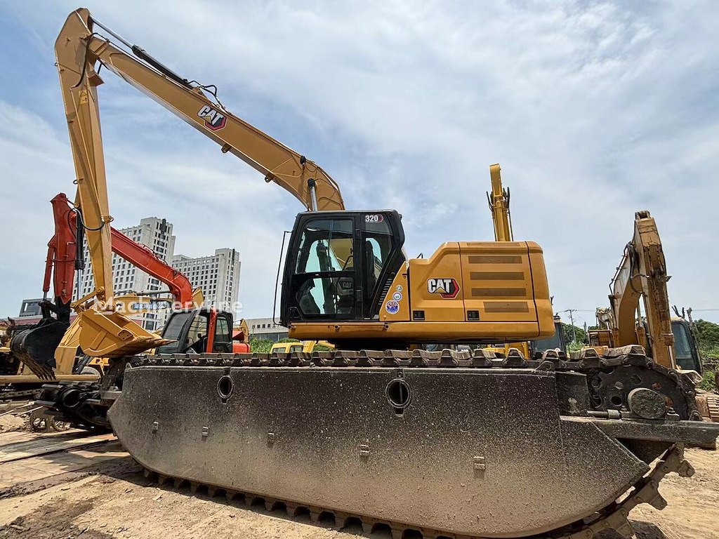 Caterpillar 320GC bager amfibija