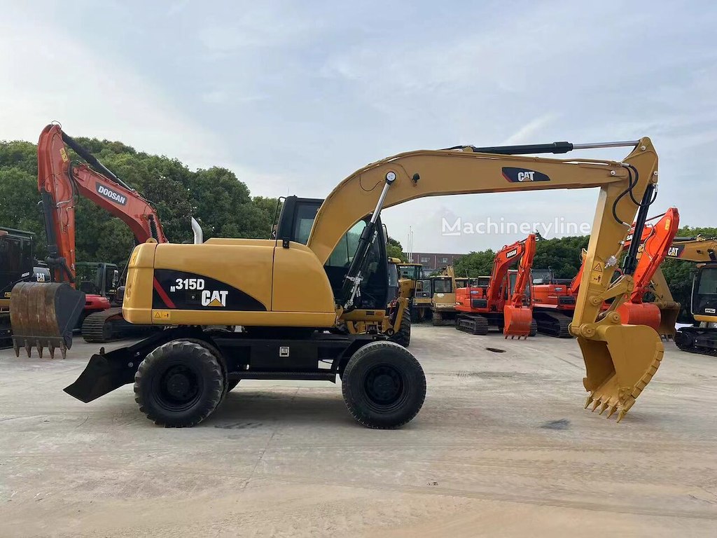 Caterpillar M315D bager točkaš