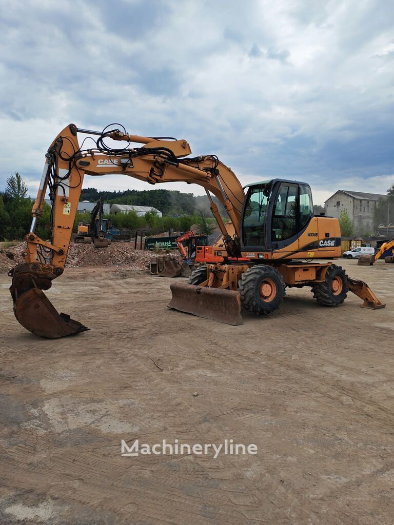 Case WX145 bager točkaš