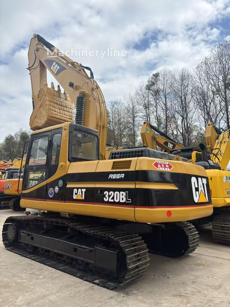 Caterpillar 320BL bager guseničar