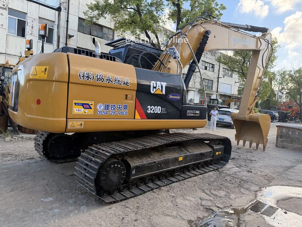 Caterpillar 320DL bager guseničar