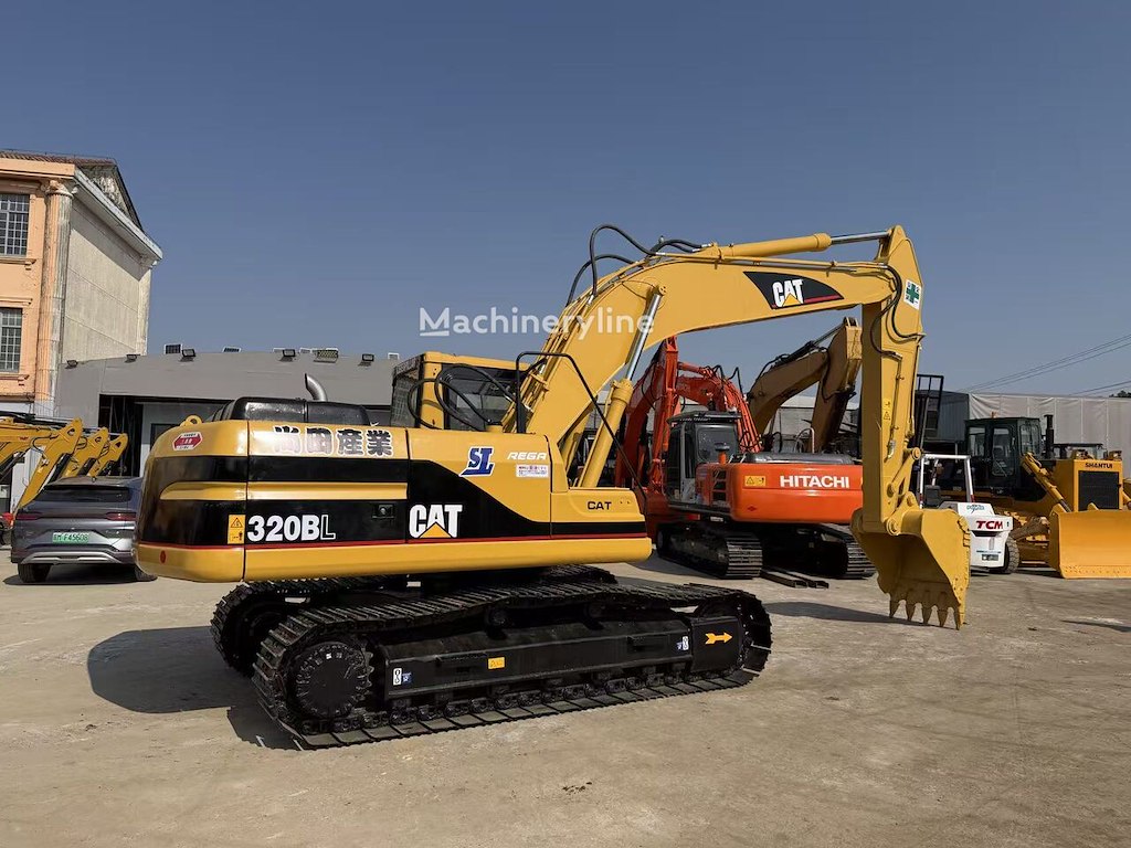 Caterpillar 320BL bager guseničar