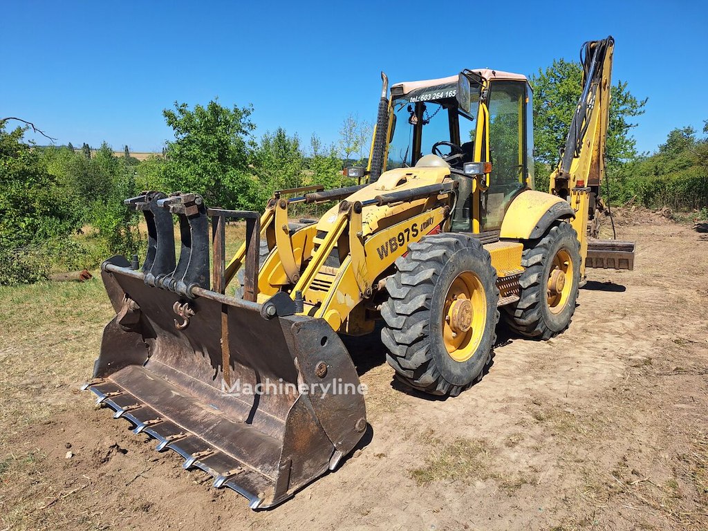 Prodaje se Komatsu WB 97 S-2 4X4 bager-utovarivač na aukciji