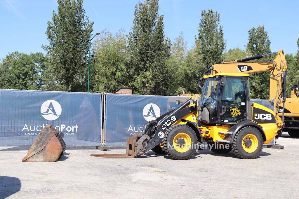 Prodaje se JCB 409 Agri prednji utovarivač na aukciji