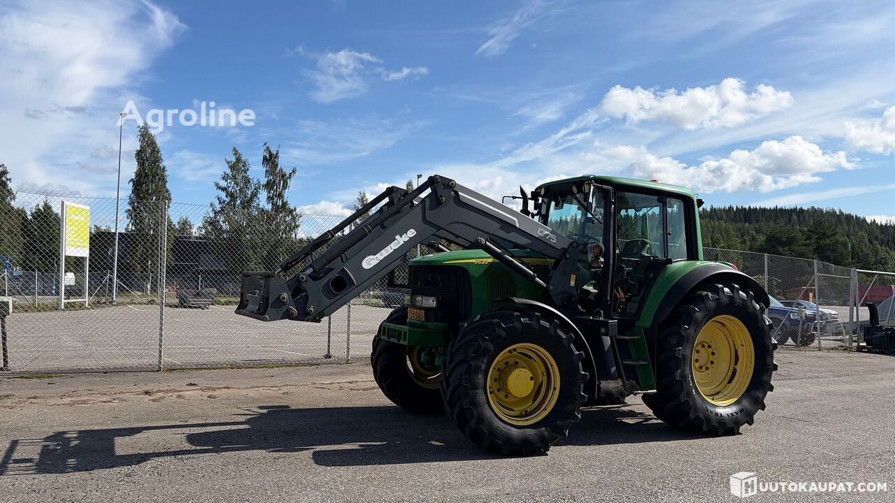 Prodaje se John Deere 6620 Autopwr + Quicke front loader, tractor, Siilinjärvi traktor točkaš na aukciji