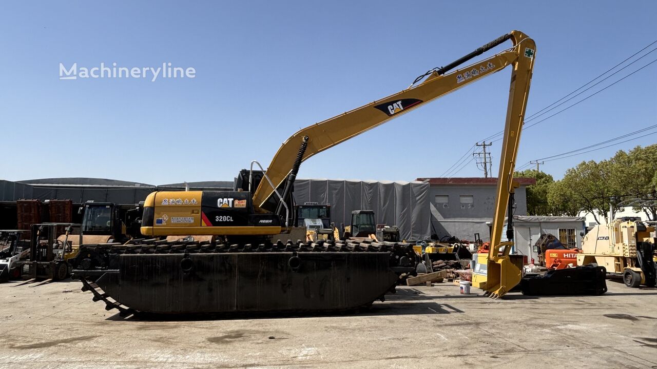 Caterpillar 320CL bager amfibija