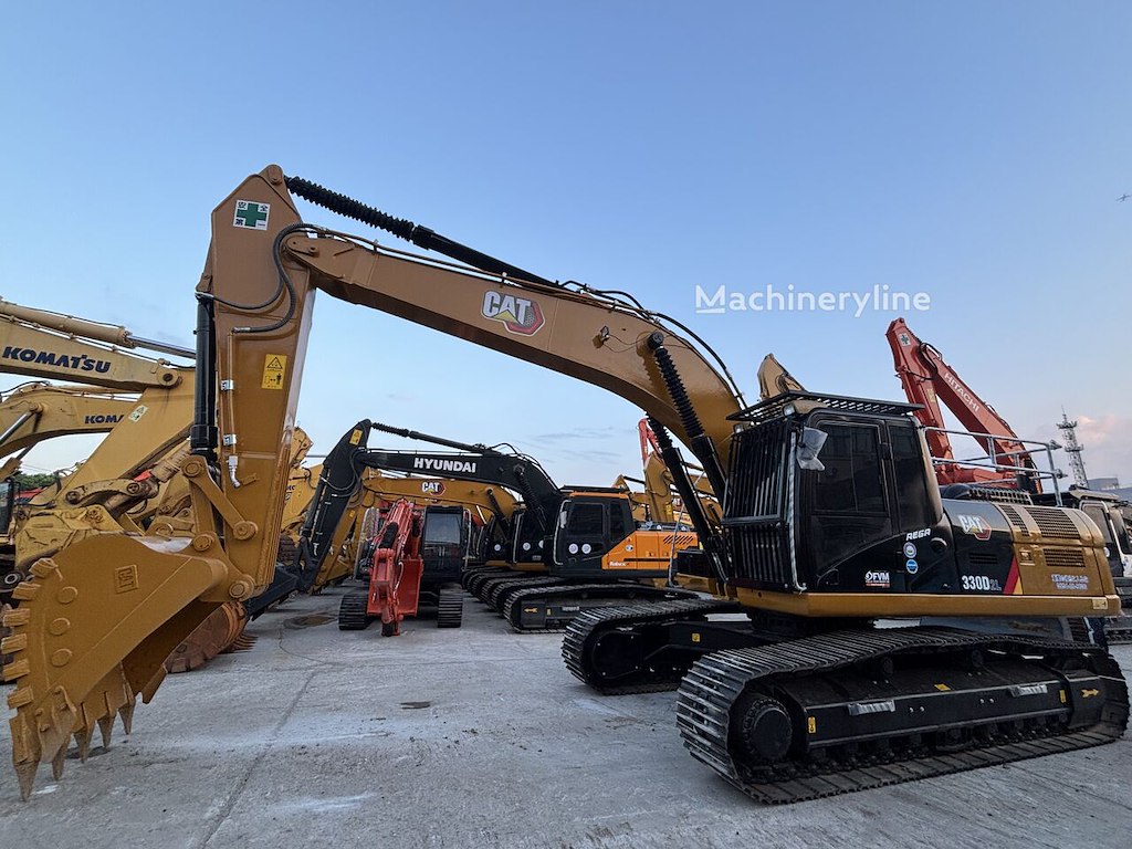 Caterpillar 330DL bager guseničar