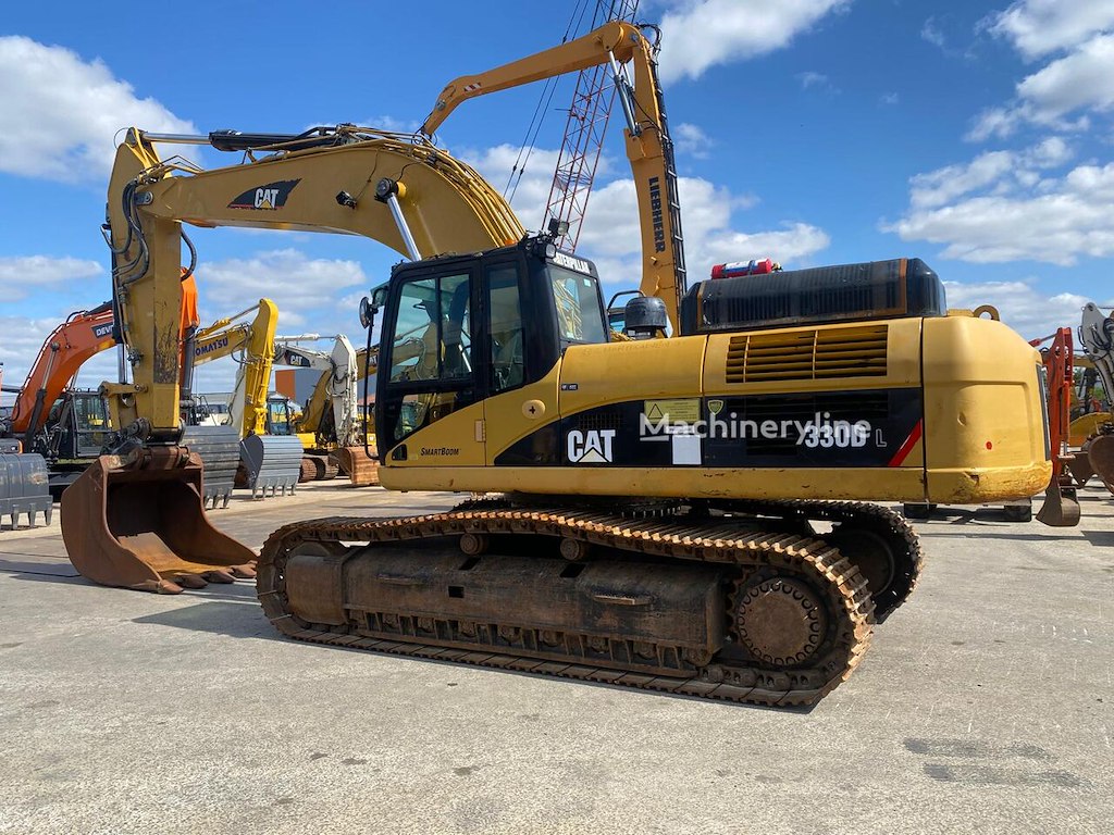 Caterpillar 330 D . bager guseničar