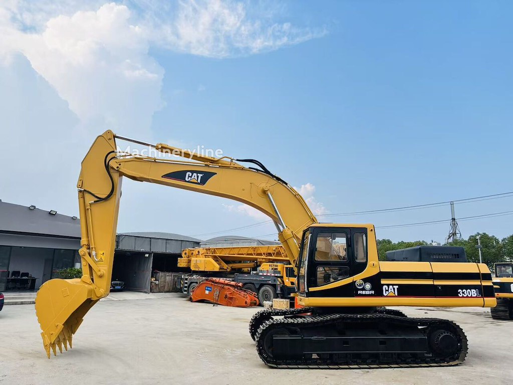 Caterpillar 330BL bager guseničar