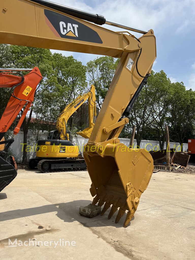 Caterpillar 325DL bager guseničar