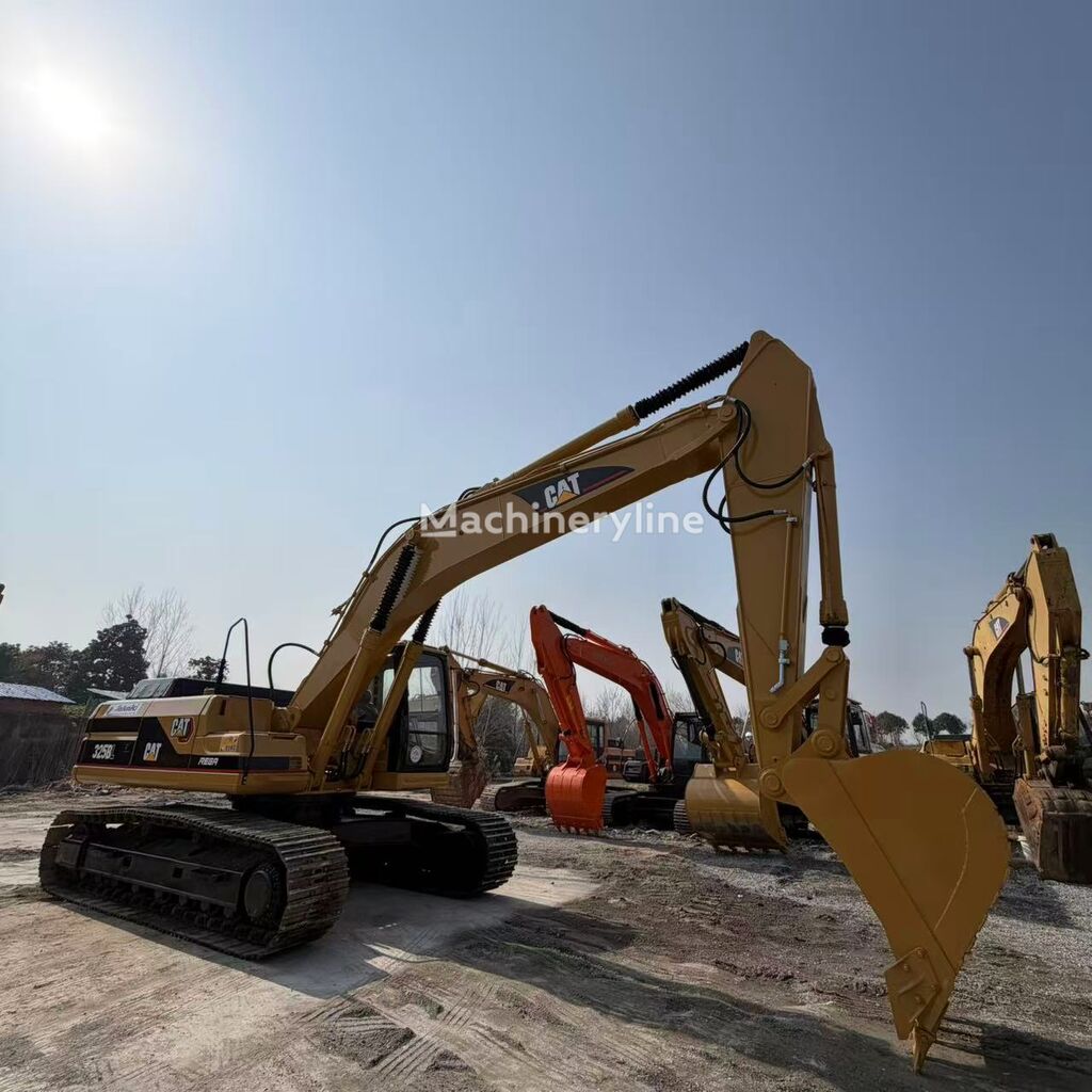 Caterpillar 325BL bager guseničar