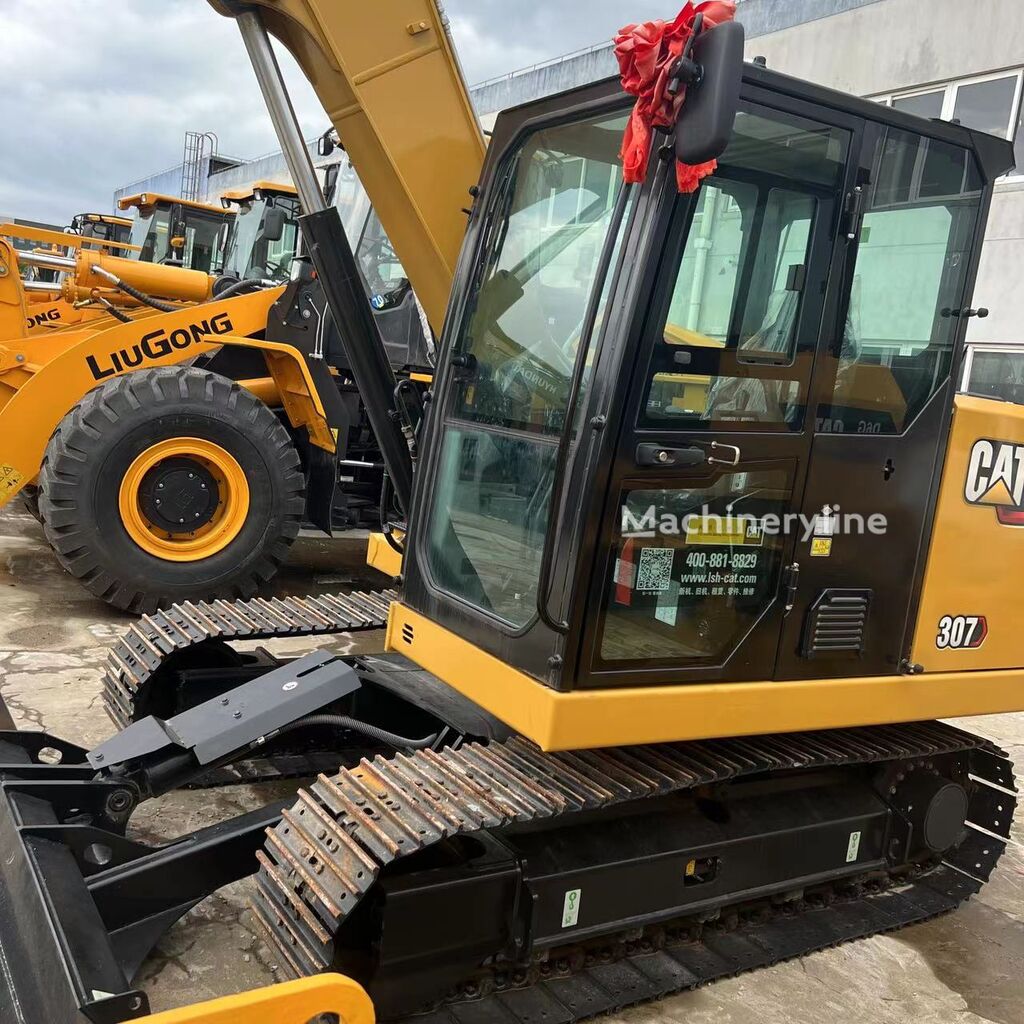 Novi Caterpillar 307 bager guseničar