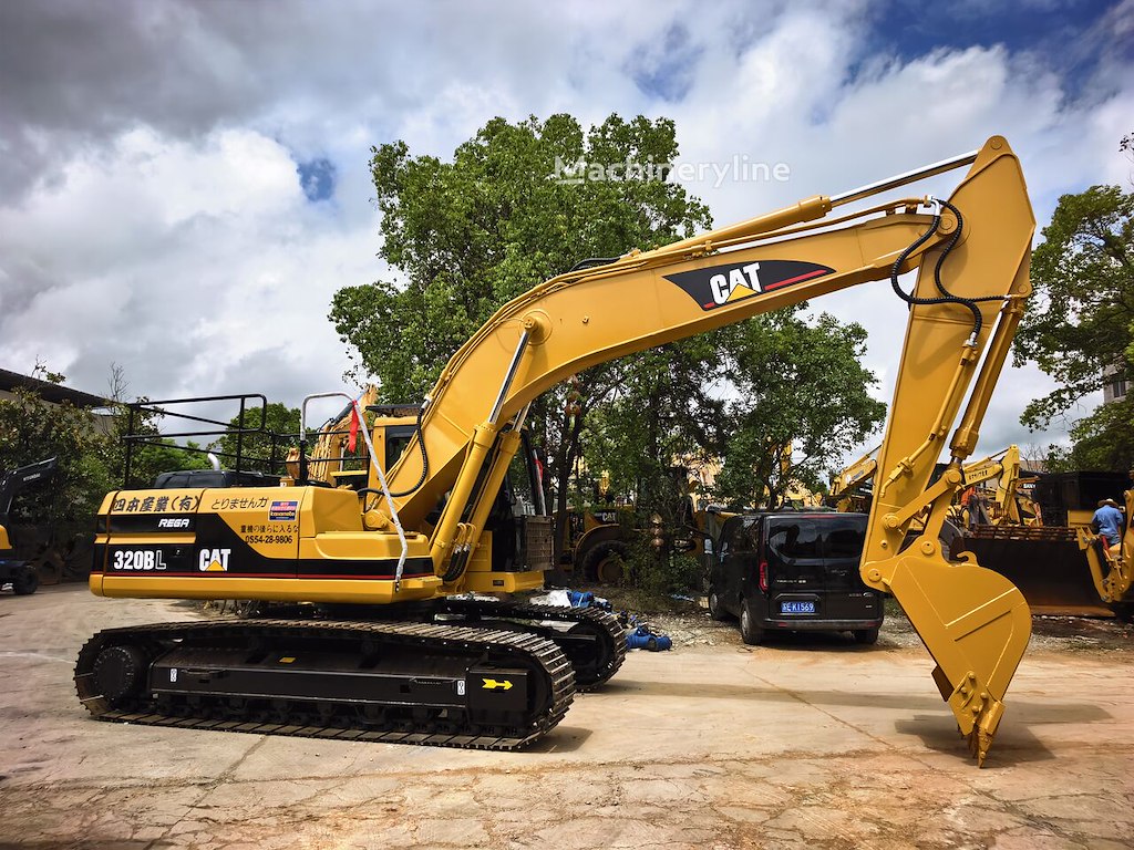 Caterpillar 320BL bager guseničar