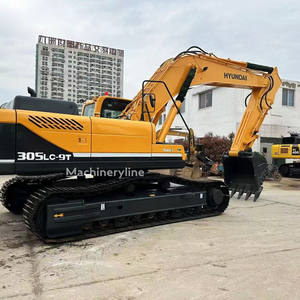 Hyundai R305 R305LC-9T bager guseničar
