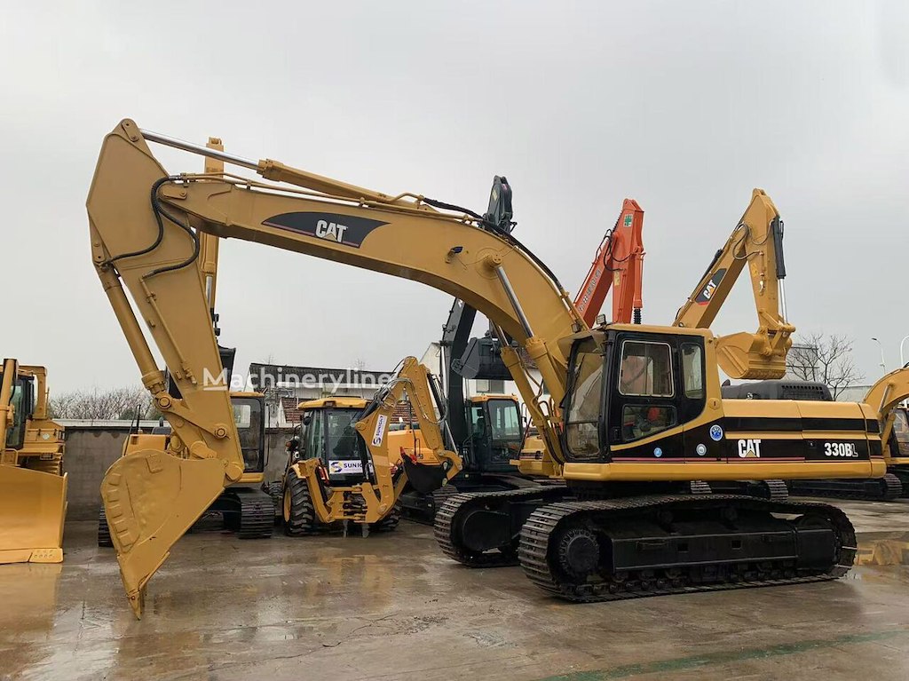Caterpillar 330BL bager guseničar