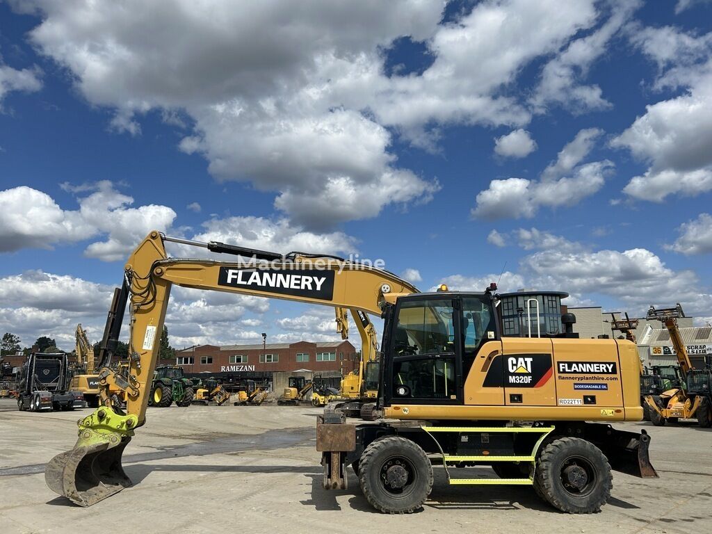 Caterpillar M320 F bager točkaš