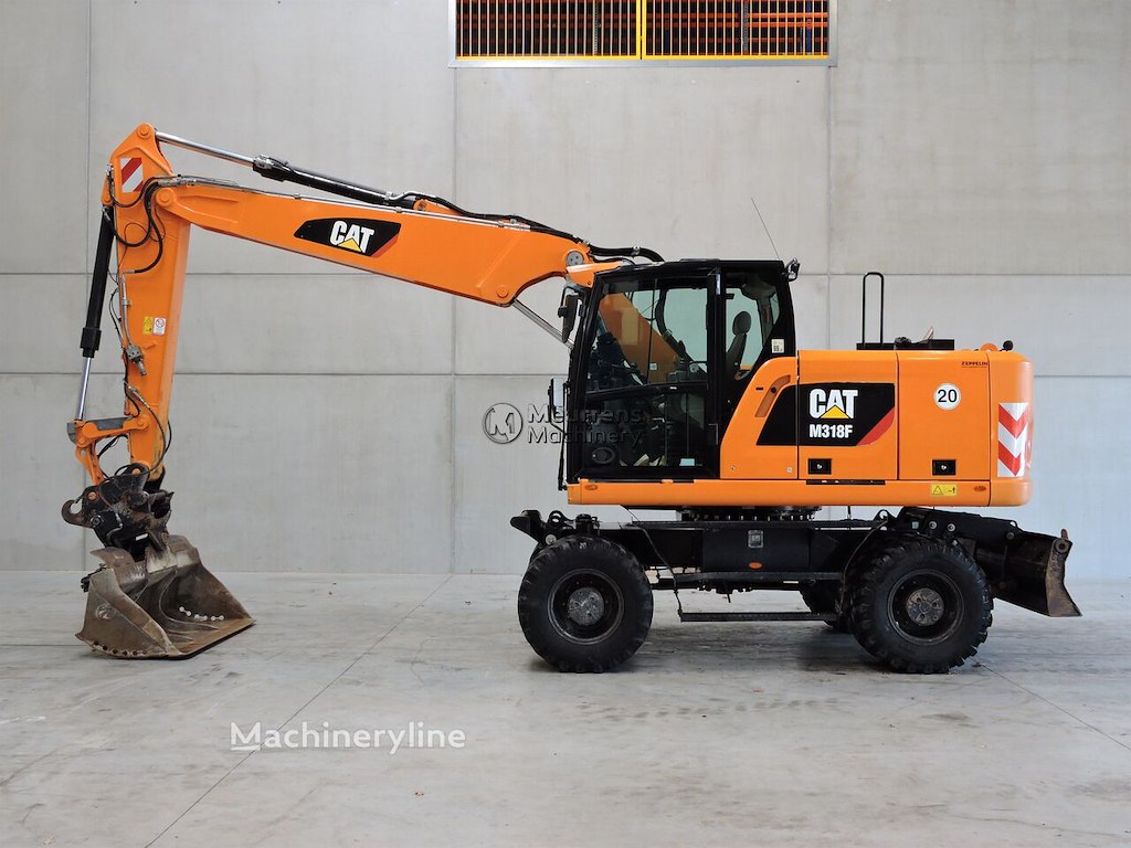 Caterpillar M318F bager točkaš