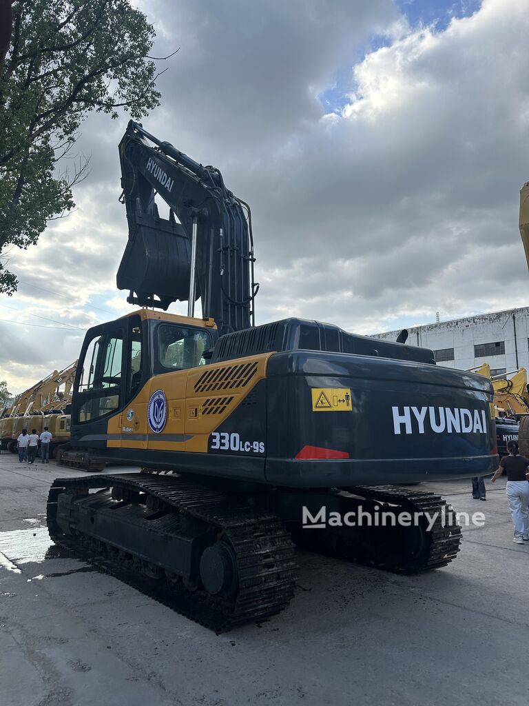 Hyundai Robex 330 bager guseničar