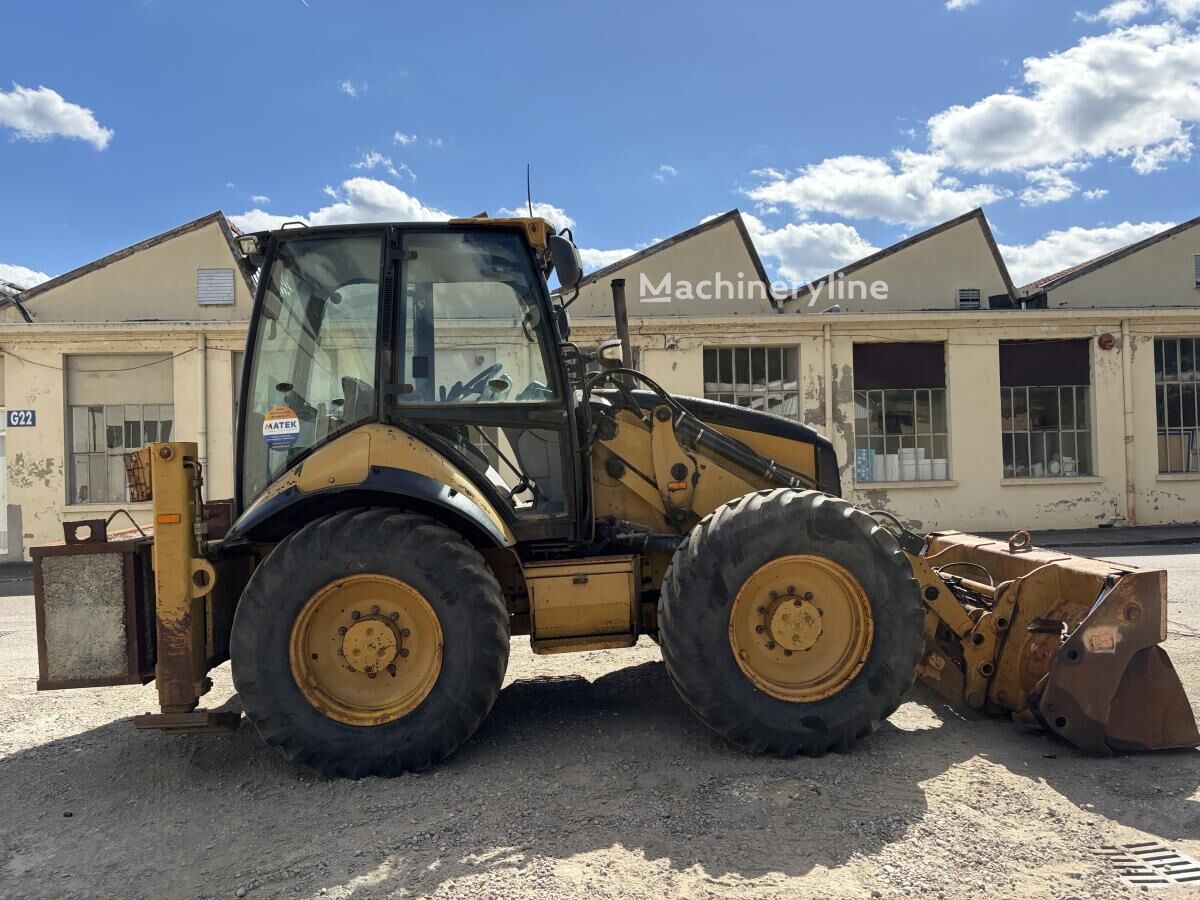 Caterpillar 442E bager-utovarivač
