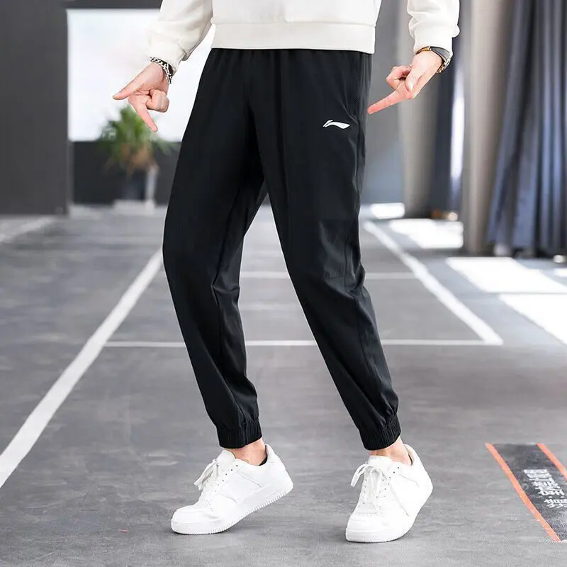 Li-Ning Muški donji deo trenerke, Crni
