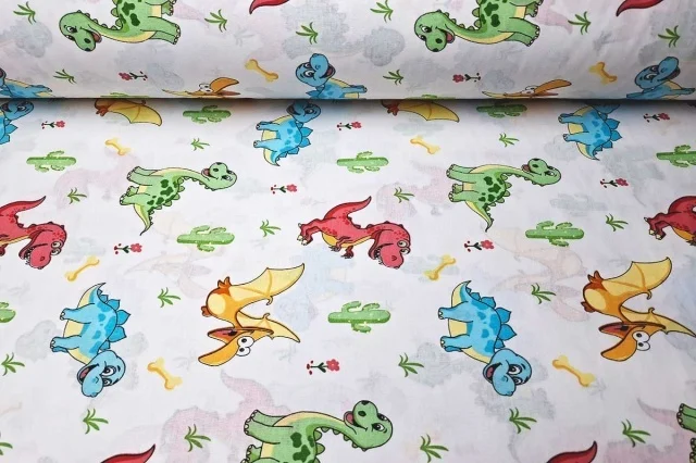 Pamučni materijal za posteljinu - dečiji dezen sa šarenim dinosaurusima
