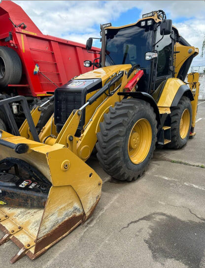 Caterpillar 444 bager-utovarivač