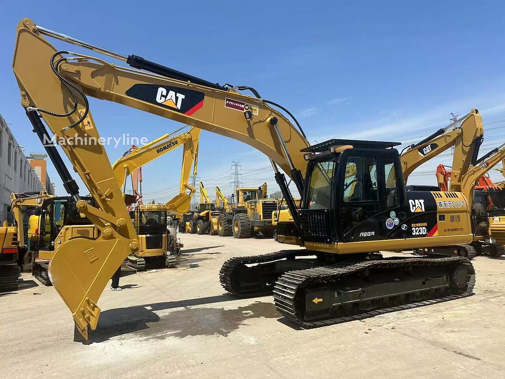 Caterpillar 323DL bager guseničar