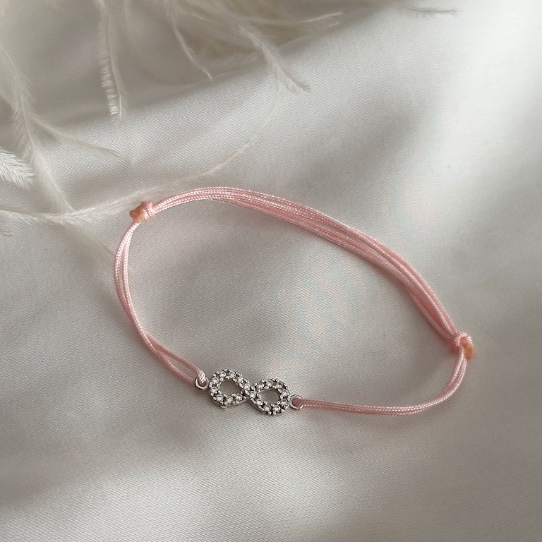 Znak beskonačno od belog zlata sa cirkonima i bebi roze koncem