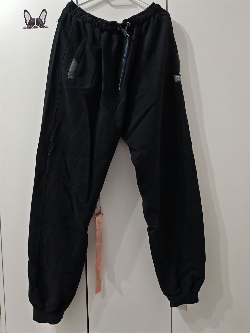 Crne trenerka pantalone (donoji deo) - Kroj: jogger/širi komforan