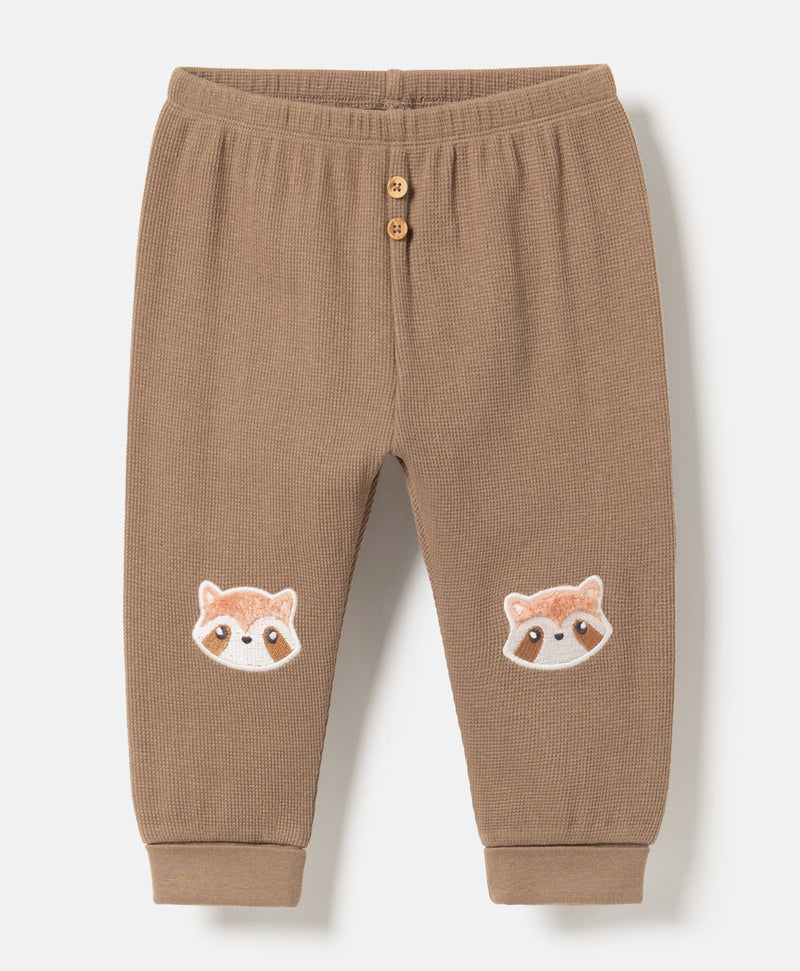 Helanke za bebe dečake od vafl pletiva sa motivom rakuna