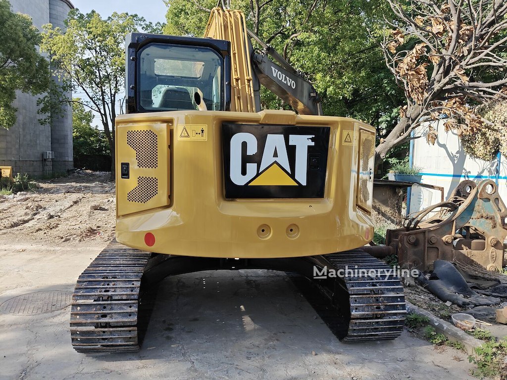 Caterpillar 310 bager guseničar
