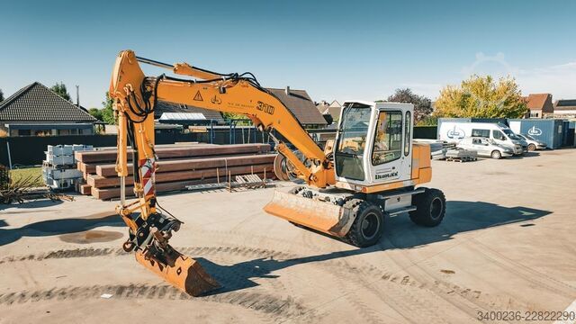 Bager
Liebherr A310B