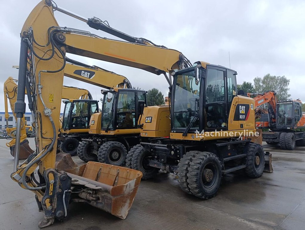 Caterpillar M317F bager točkaš