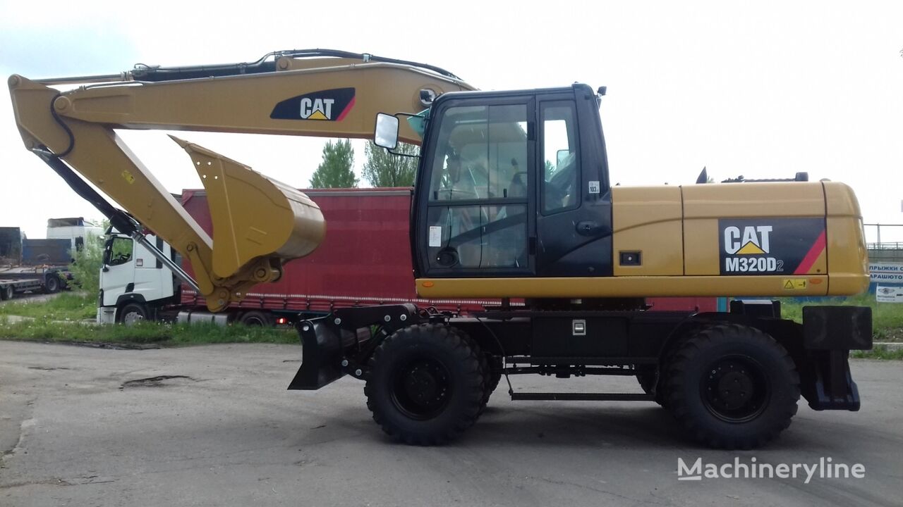 Caterpillar 320D bager točkaš