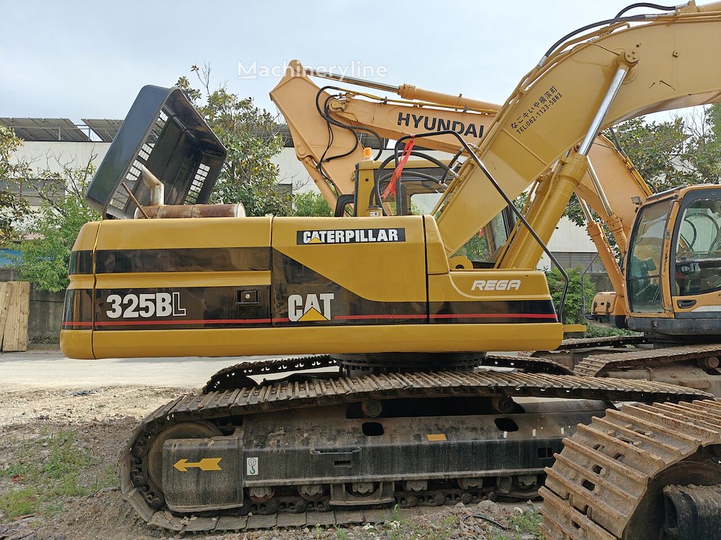 Caterpillar 325BL bager guseničar