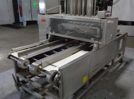 SPI Automation Precision Automated Technology, mašina za izbacivanje kolačića iz plehova za mafine/kapkejkove
