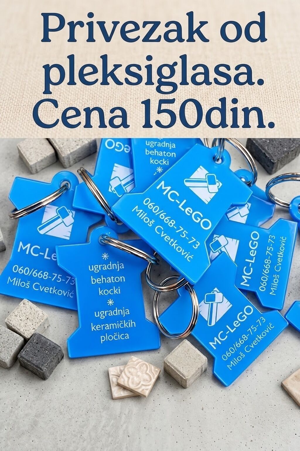 Privezak od pleksiglasa – plavi, u obliku majice, sa metalnim alkom za