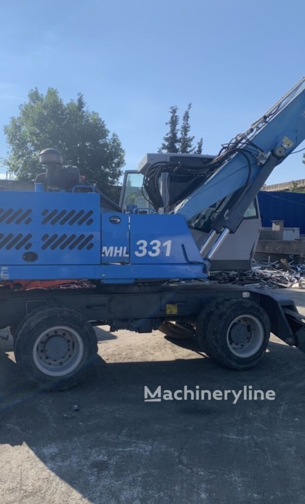 Fuchs MHL 331 bager za pretovar
