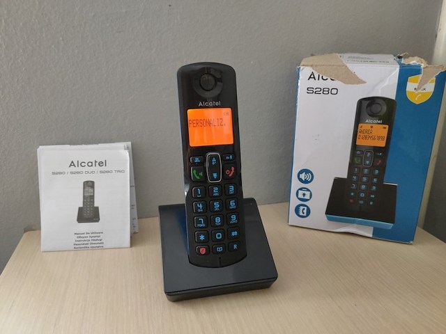 Dobar Alcatel bezicni telefon crno-plavi u kutiji.