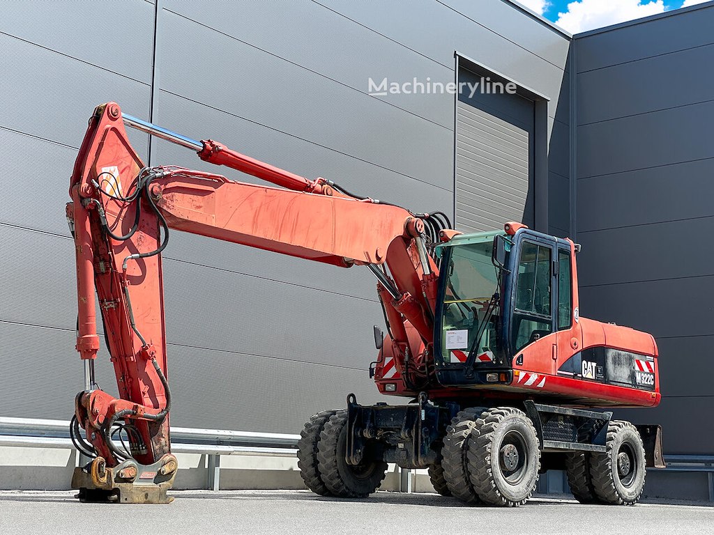 Caterpillar M322C Bagger bager točkaš