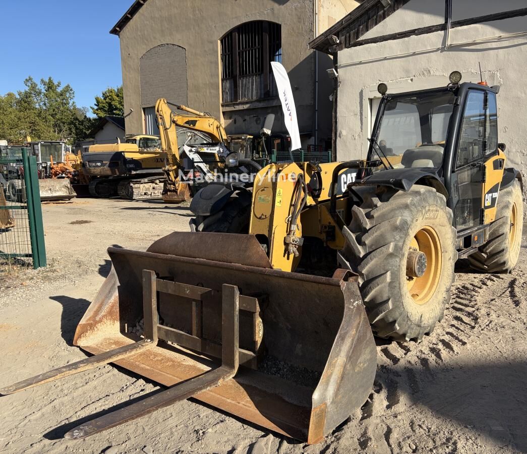 Caterpillar TH330B teleskopski utovarivač