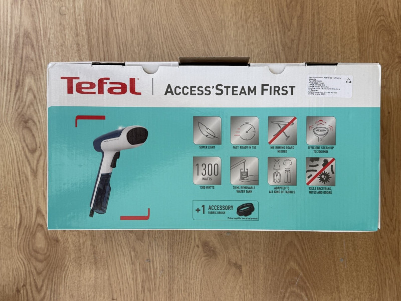 Vertikalna pegla na paru TEFAL