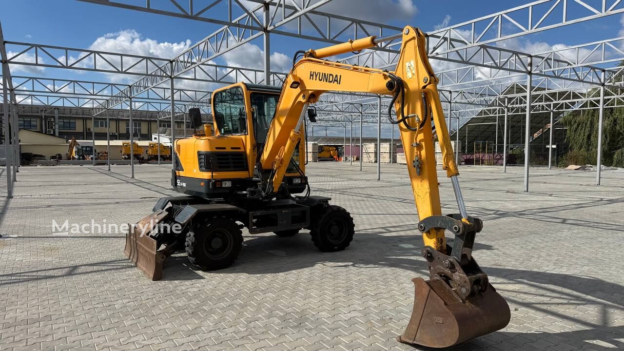 Hyundai Robex R55W-9A bager točkaš
