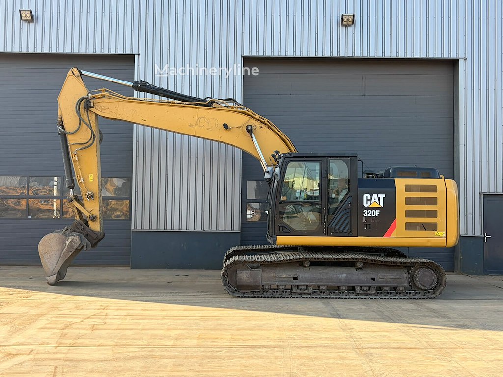 Caterpillar 320FL bager guseničar