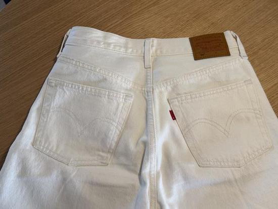 Levi’s 501 white jeans