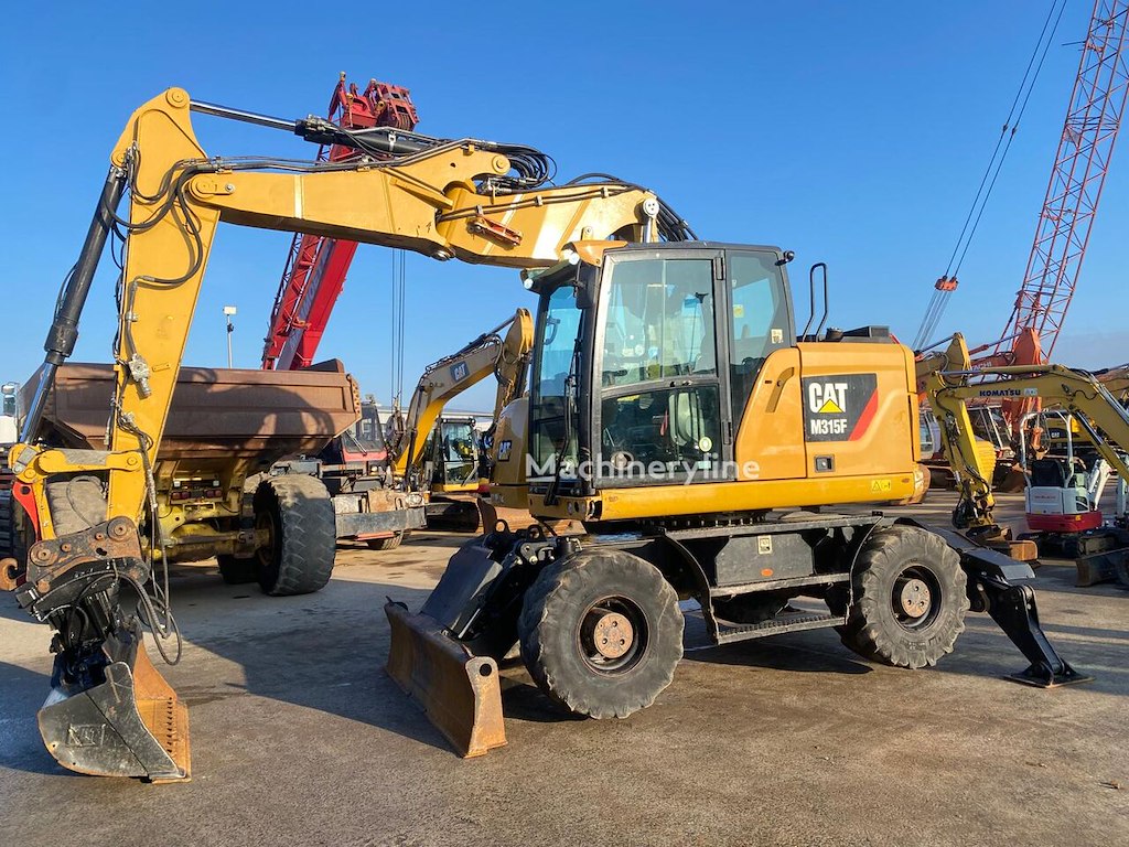 Caterpillar M315F . bager točkaš