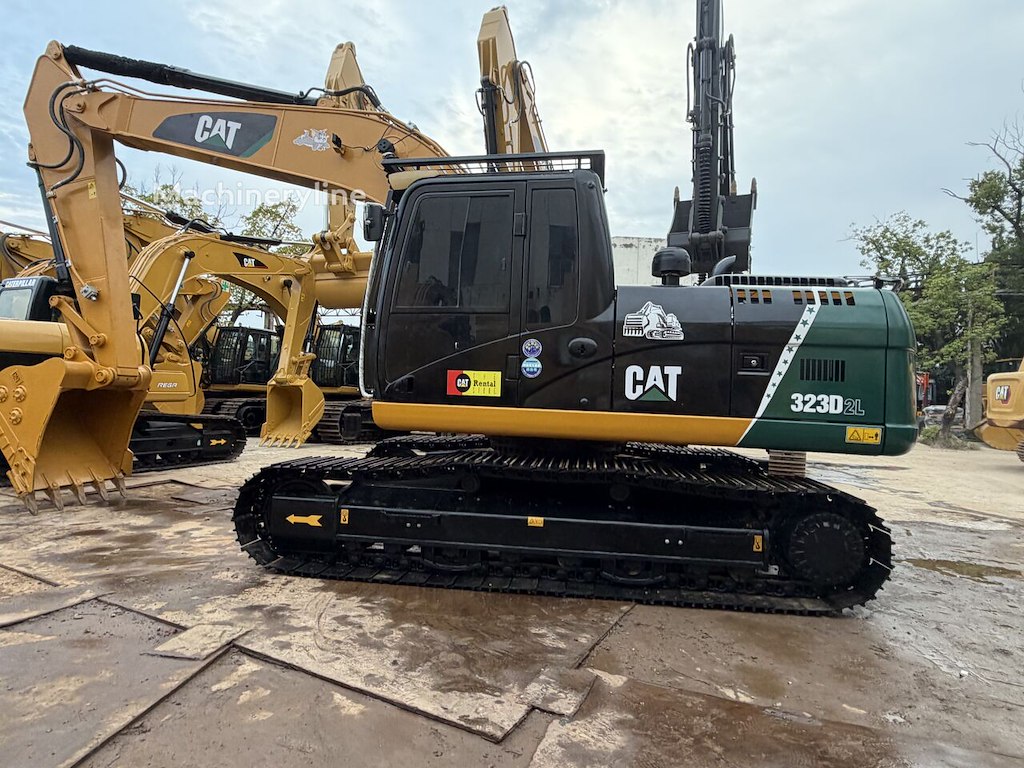 Caterpillar 323DL bager guseničar